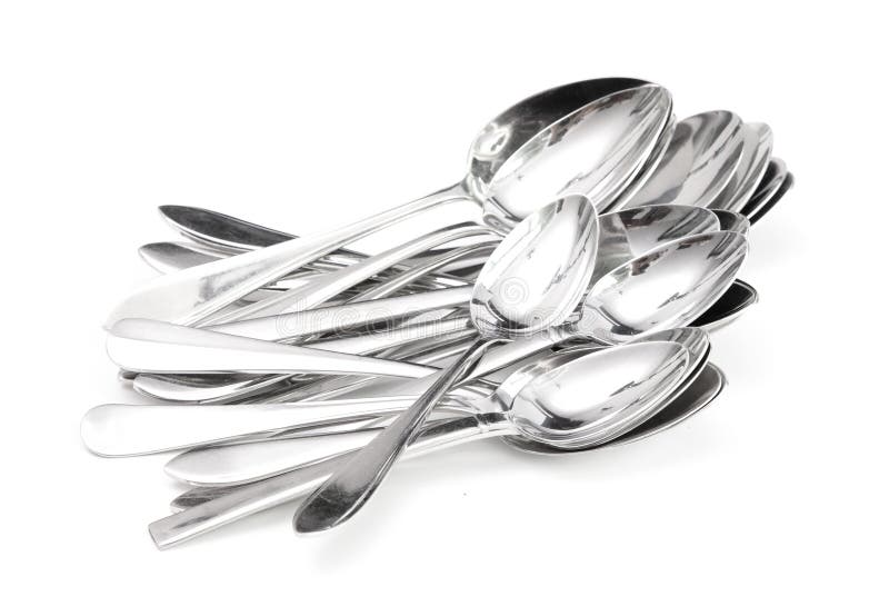 Pile of metal spoons stock photo. Image of desert, pudding - 241695302