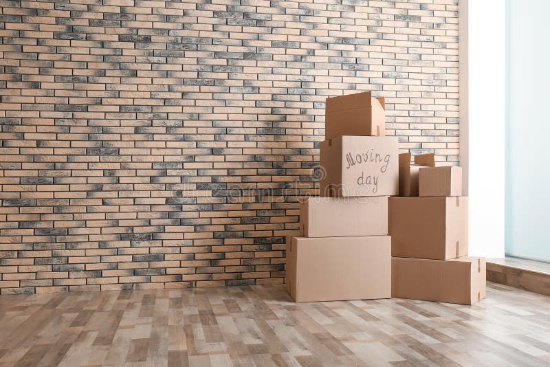 Pile of Moving Boxes in Room Stock Image - Image of boxes, postal ...
