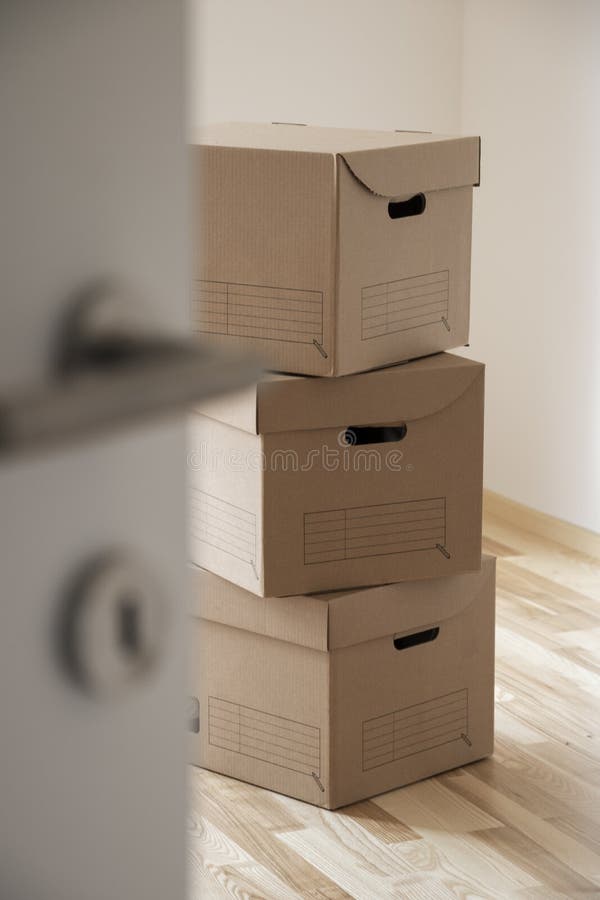 Pile of Moving Boxes in Empty Room Stock Image - Image of packing ...