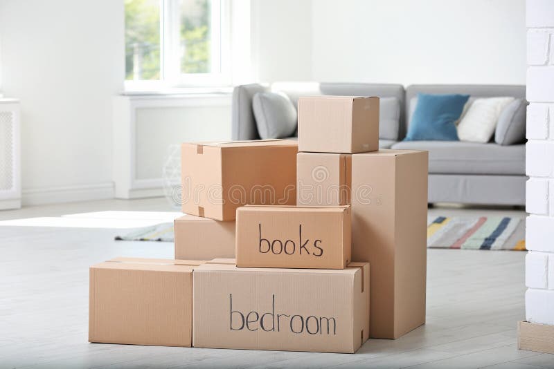 Pile of moving boxes stock image. Image of bedroom, couch - 125266151