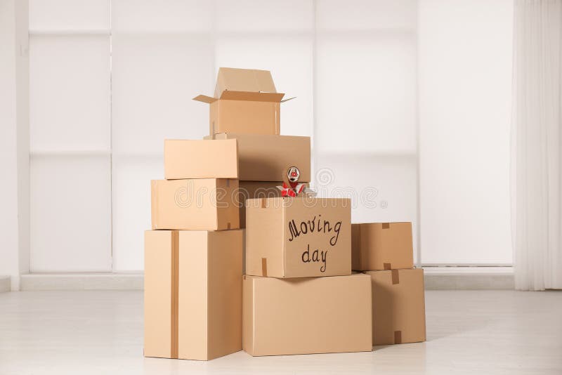 Pile of Moving Boxes in Room Stock Image - Image of boxes, postal ...