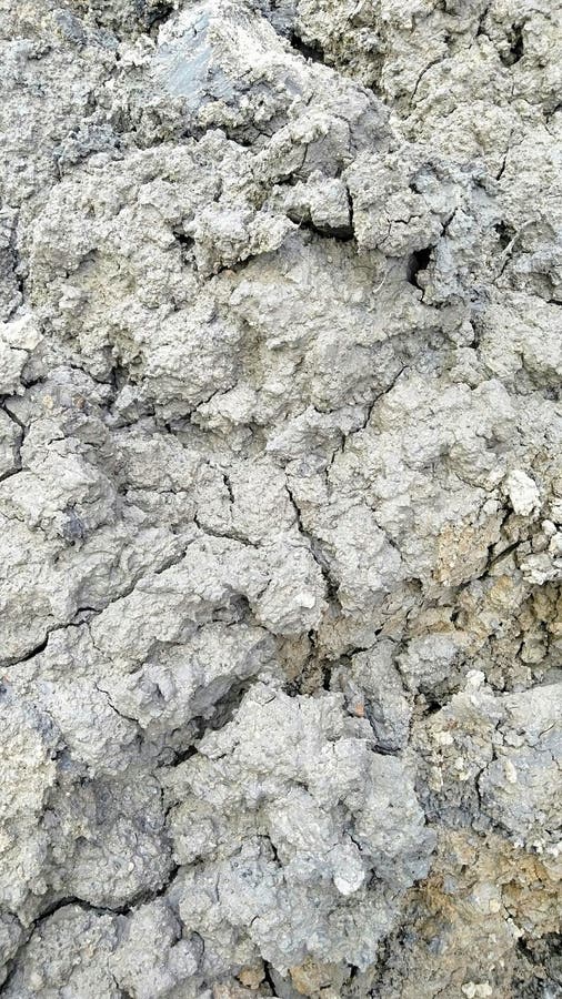 A pile of muddy soil. stock photo. Image of wall, asphalt - 195983160