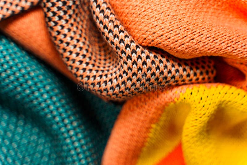 A Pile of Multi-colored Knitted Fabrics Stock Image - Image of orange ...
