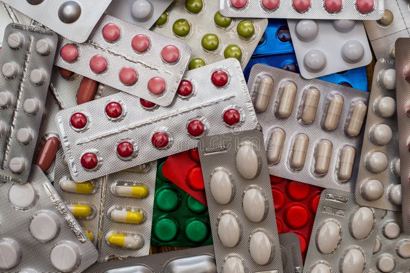 A Pile of Multi-colored Pills Lie One on One Stock Image - Image of ...