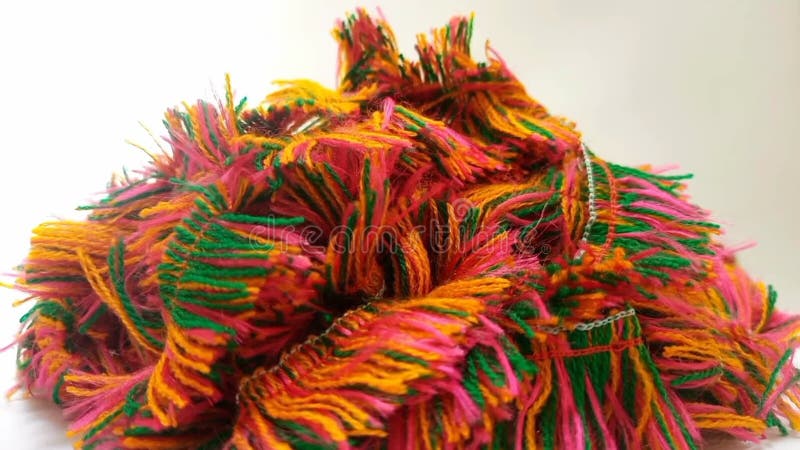 A Pile of Multicolored Thread Strands Rotating on White Background ...