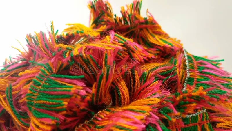 A Pile of Multicolored Thread Strands Rotating on White Background ...