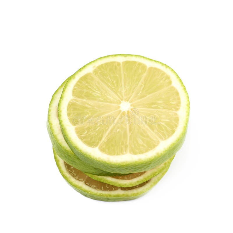 Fresh Lime Cut In Slices Isolated Over The White Stock Photo - Image of ...