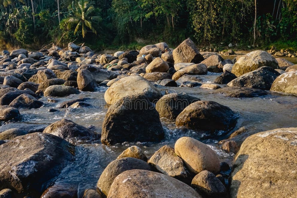 Pile of Natural Rocks by the River Stock Photo - Image of landscape ...