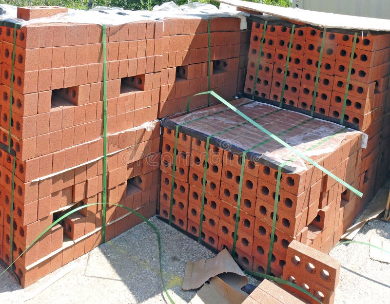 Pile of New Bricks on Construction Site Stock Photo - Image of ...