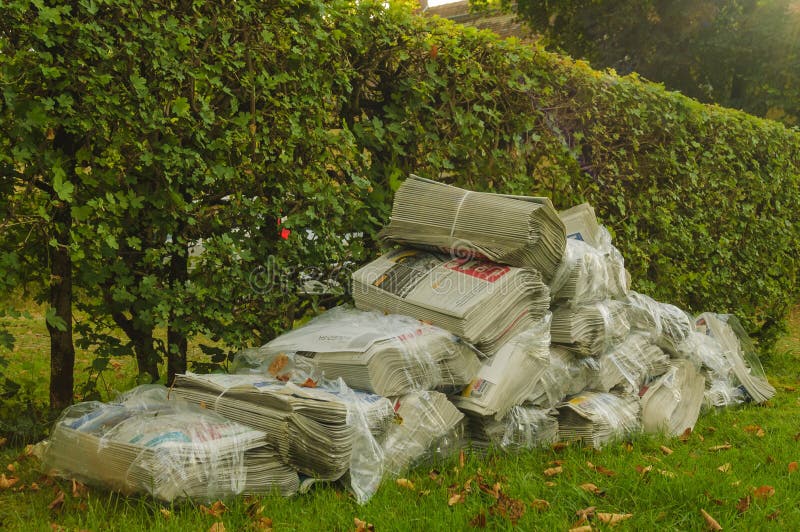 Pile of newspapers editorial stock photo. Image of newspaper - 232029858