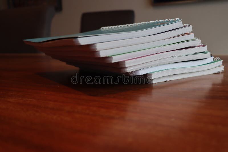 Pile of Notebooks on a Wooden Table Stock Image - Image of stationery ...