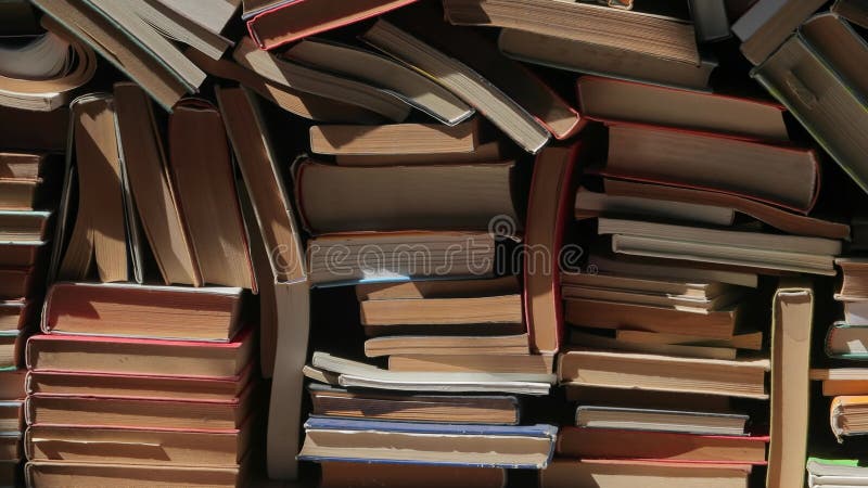 Wall of books piled up stock video. Video of attic, literature - 163583197