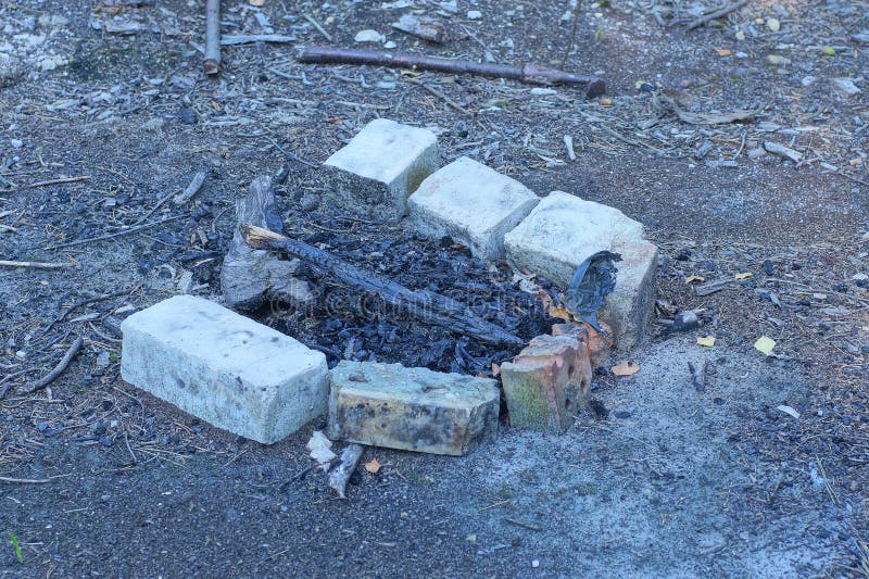 A Pile of Old Bricks in an Extinct Campfire on the Ground Stock Image ...