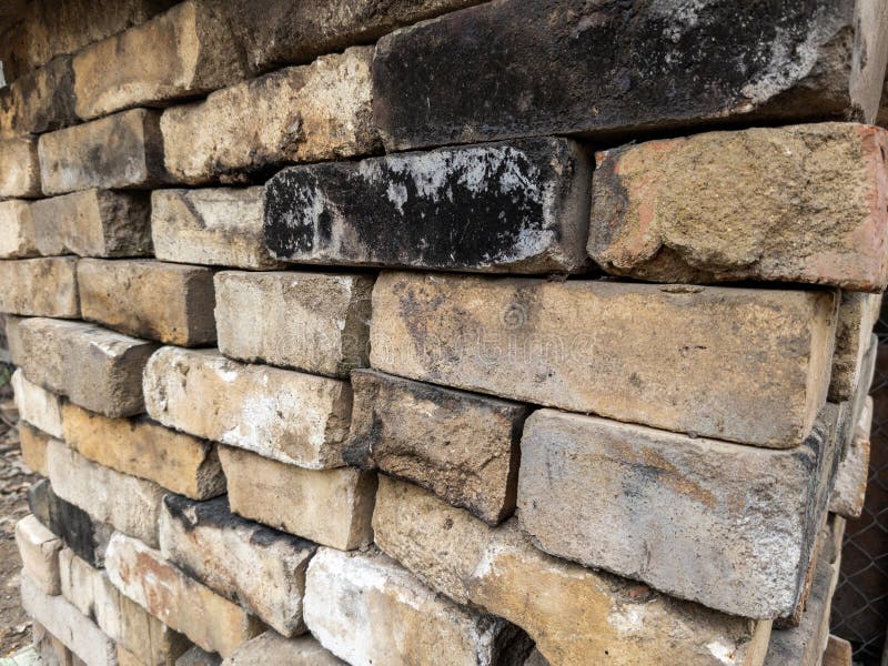 A Pile of Old Bricks Stacked on Top of Each Other Stock Photo - Image ...
