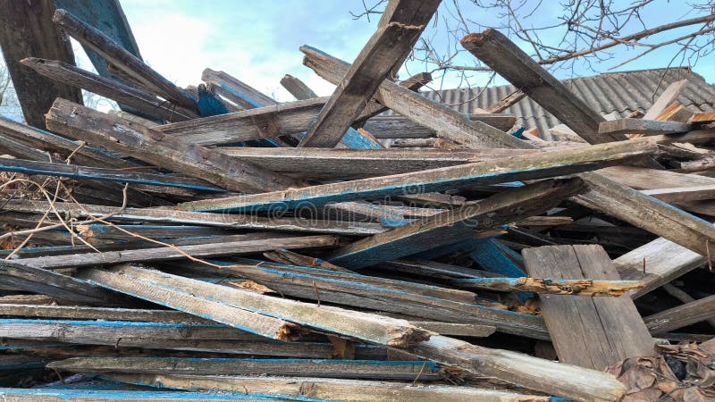 Pile of Old Wooden Boards in a Scrapyard, Ready for Recycling Stock ...