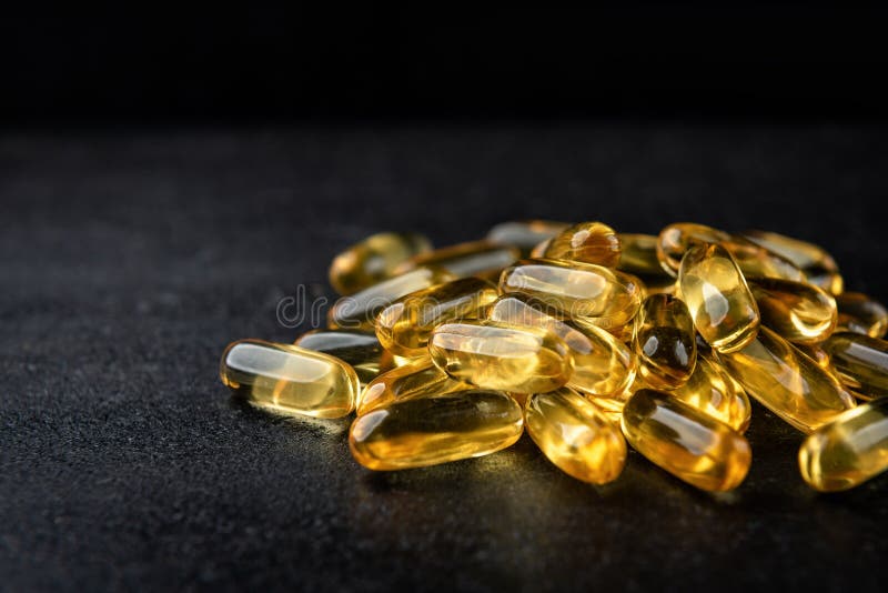 Pile of Omega-3 Capsules on Black Background. Stock Photo - Image of ...