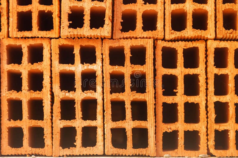 Stack of Orange Construction Bricks Stacked on Top of Each Other Stock Photo - Image of ...