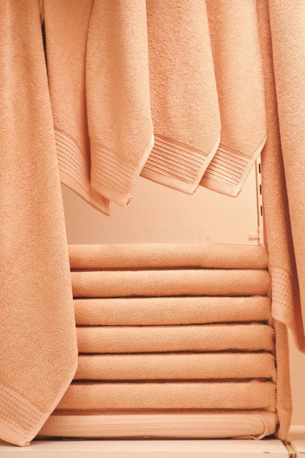 Pile Orange Color of Terry Towels on the Shelf. Stock Image - Image of ...