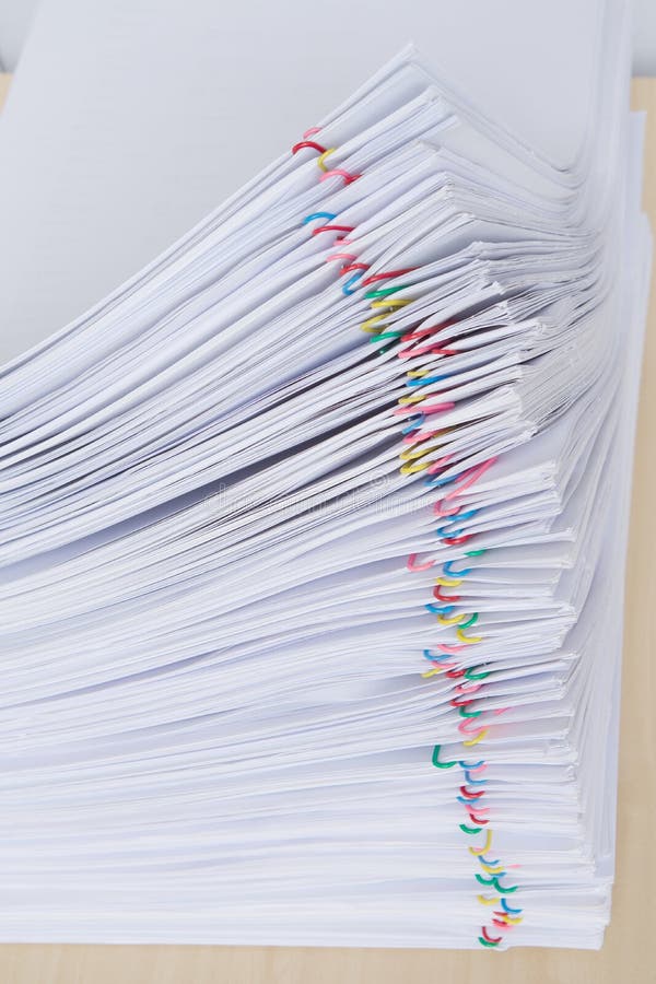 Colorful Paper Clip with Pile of Overload Document and Reports Stock ...