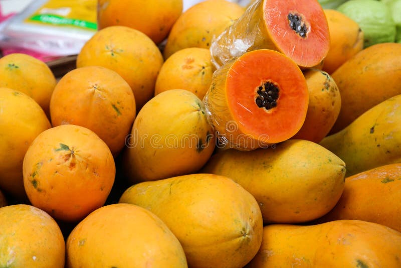 Ripe and raw papaya fruit. stock image. Image of orchard - 37482103