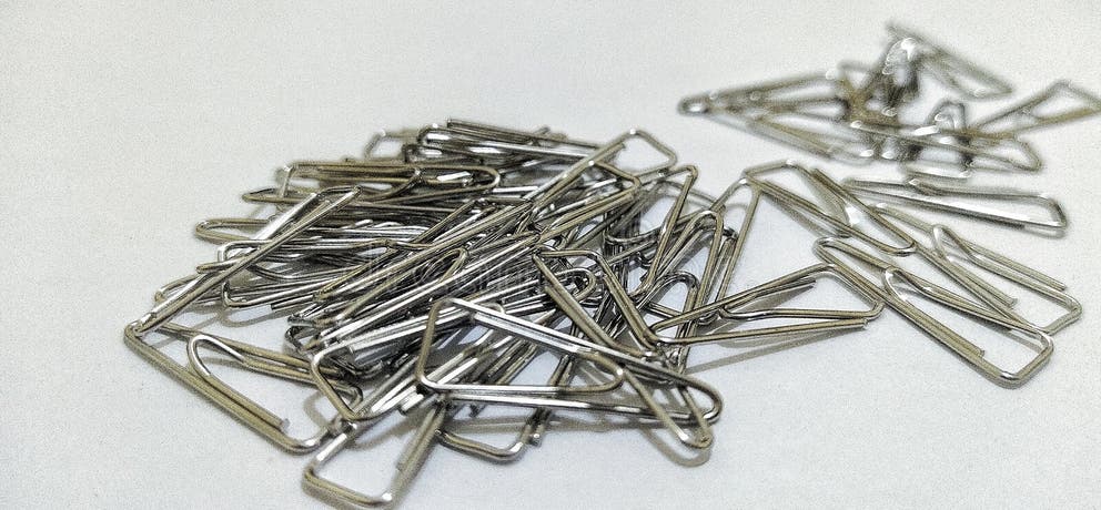 Pile of Paper Clips on the Desk Stock Photo - Image of trigonal, branch ...
