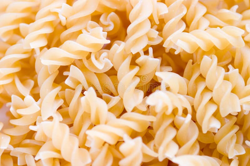 Pasta Twirls, Whole Wheat Spaghetti and Brown Rice on a Wooden Table ...