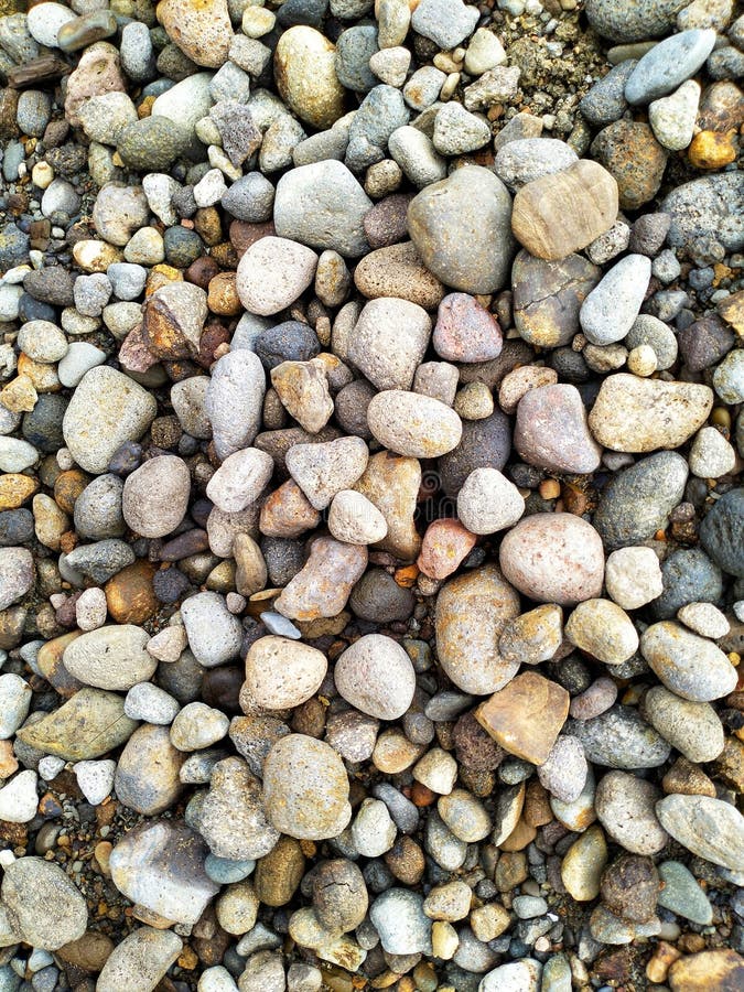 Pile of Pebbles on the Sand Stock Image - Image of materials, sand ...