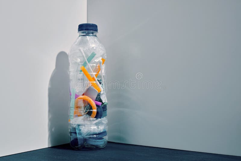 Pile of Plastic Objects in a Plastic Drinking Water Bottle ...
