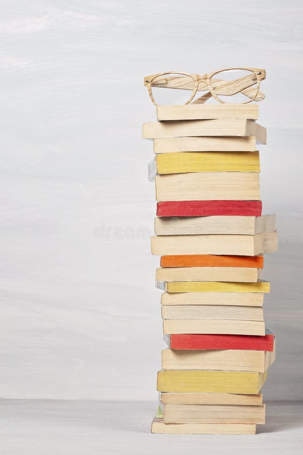 Pile of pocket books stock image. Image of college, pile - 143954395