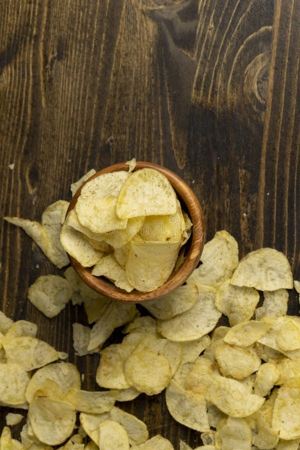 Pile of Potato Chips on the Table Stock Photo - Image of tasty ...