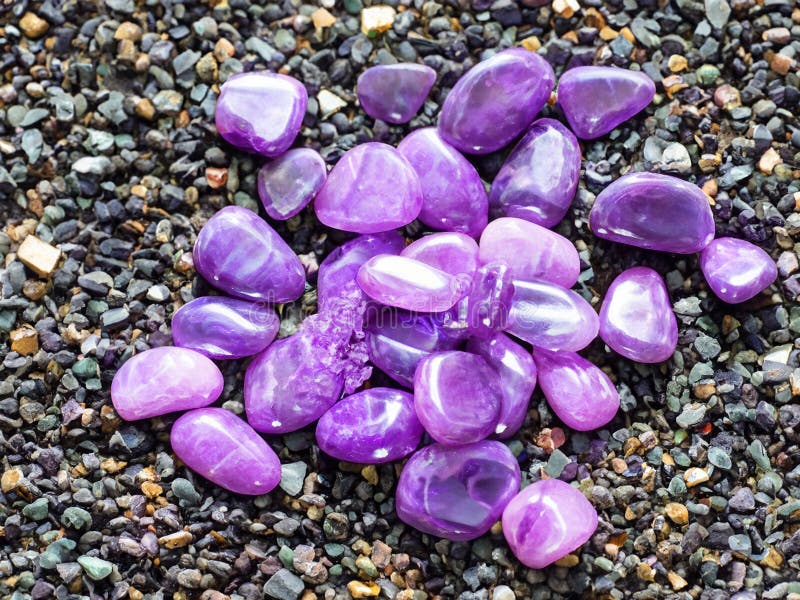 A Pile of Purple Crystals on a Gravel Ground Stock Image - Image of ...