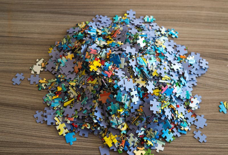 Pile of Puzzles Lies on the Table Stock Photo - Image of conundrum ...