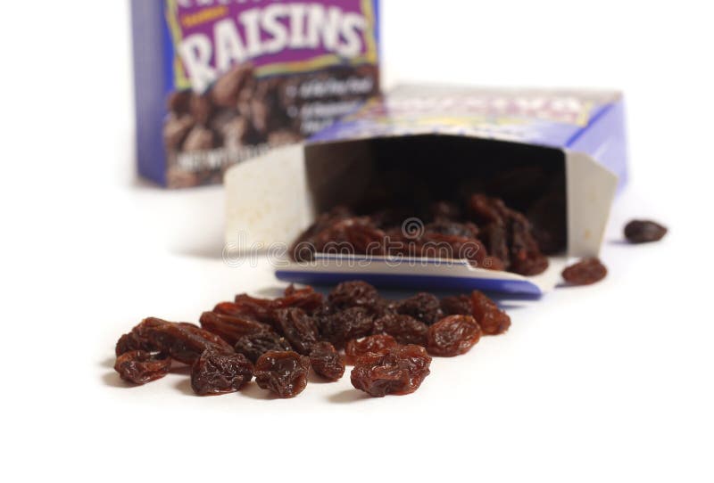 Pile of Raisins with Box Isolated on White Background Stock Image ...