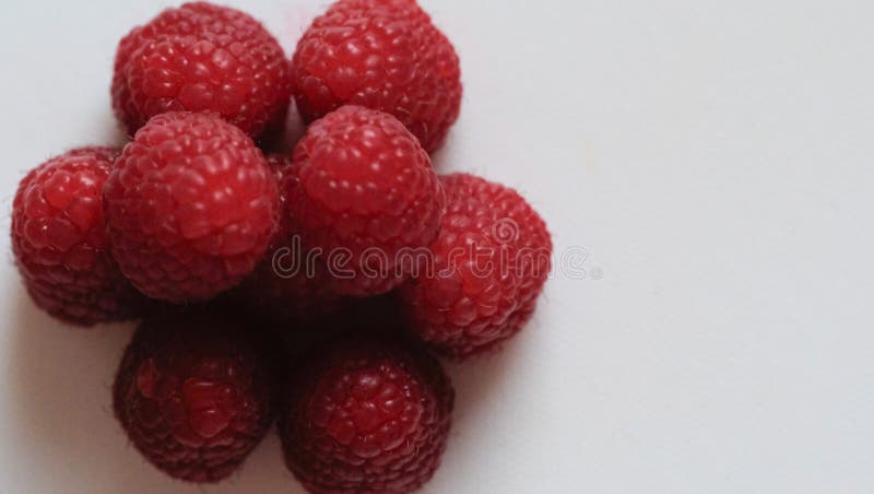 Pile of Raspberries on a White Surface Stock Photo - Image of produce ...