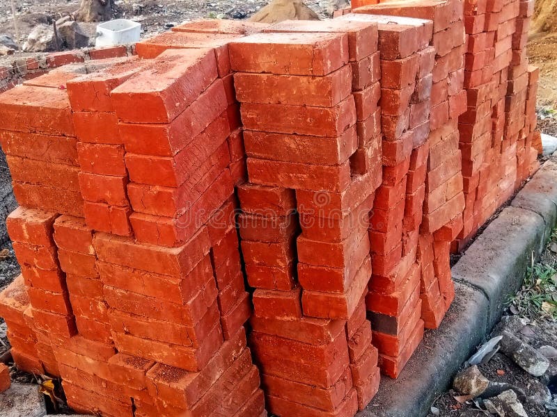 Pile of Red Bricks on the Side of the Road To Build a House Stock Photo ...