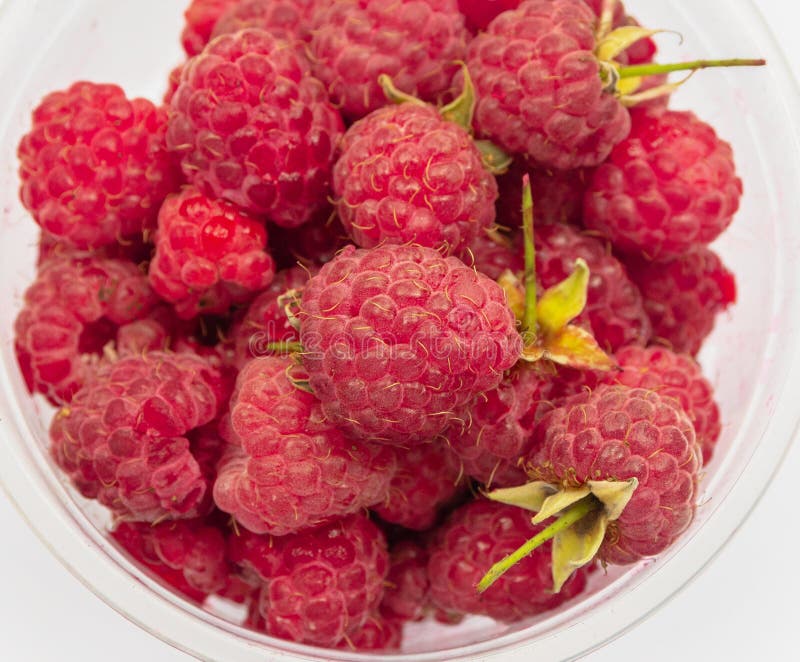 A Pile of Red Fresh Raspberries Located on a White Background Stock ...