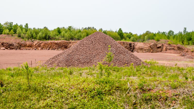 Pile of Red Rocks on Construction Site Stock Photo - Image of stones ...