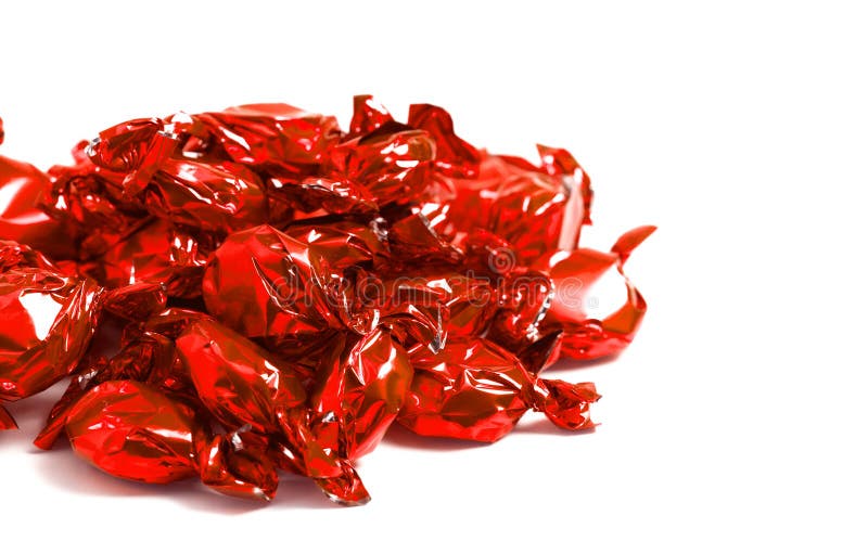 Pile of Red Wrapped Candy Isolated on a White Background Stock Photo ...