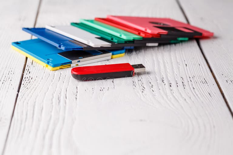 Pile of Retro Floppy Disk Versus Usb Flash Driver Stock Photo - Image ...