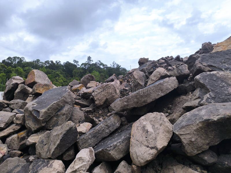 Pile of rock material stock photo. Image of material - 383967238