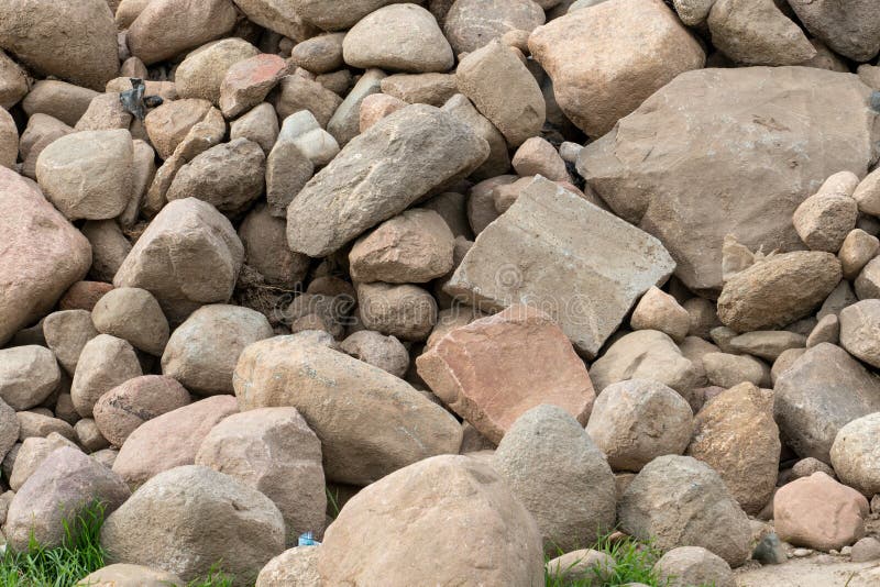 A Pile or Pile of Rocks on the Beach. a Lot of Big Stones Stock Photo ...