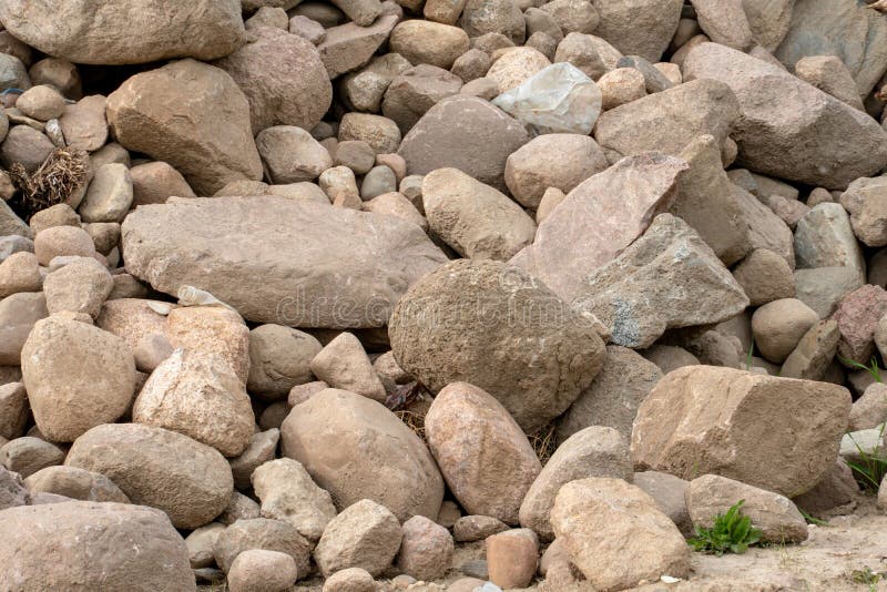 A Pile or Pile of Rocks on the Beach. a Lot of Big Stones Stock Photo ...