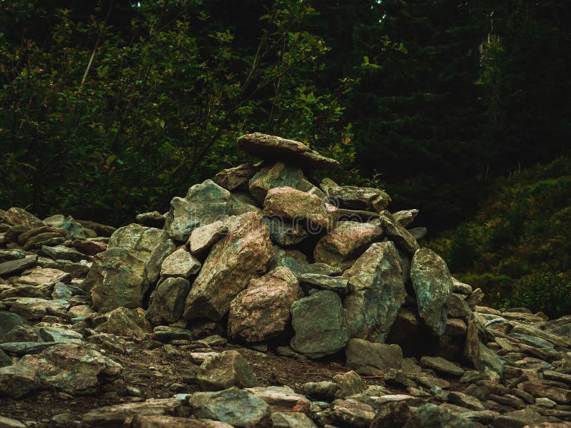 Pile of Rocks Covered in Dirt in a Forest Stock Image - Image of light ...