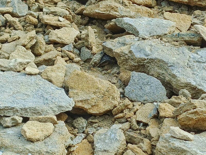 Pile of Rocks on a Large Area Stock Image - Image of rocks, large ...