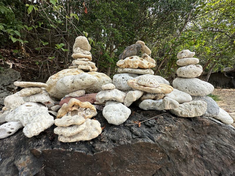 A Pile of Rocks that are Neatly Stacked on Top of Each Other on a Rock ...
