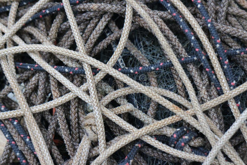 A Pile of Old Ropes on a Jetty in the Tropics Stock Image - Image of ...