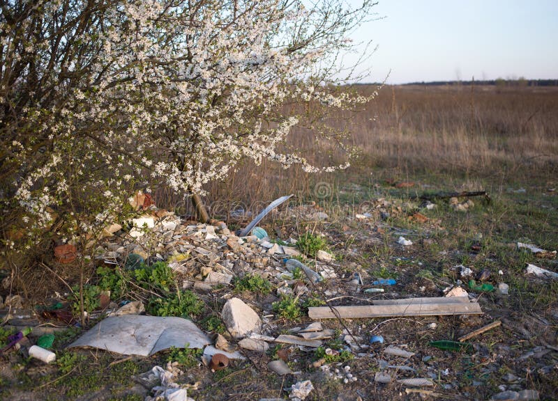 Pile of Rubbish from Plastic Bottles, Construction Waste on the Grass ...