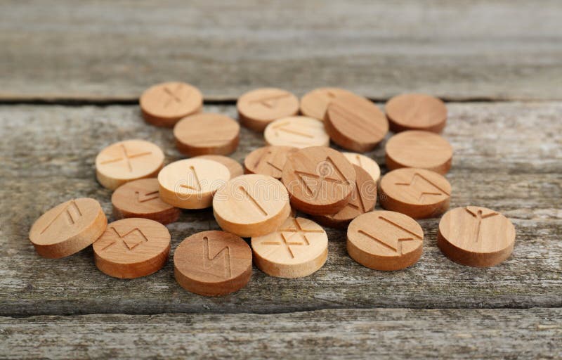 Pile of Runes with Different Symbols on Wooden Table Stock Photo ...
