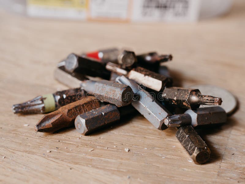 Pile of Rusty Bits on Wooden Background Stock Image - Image of bits ...
