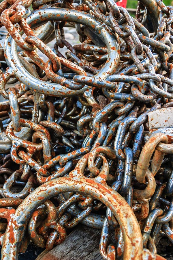 A Pile of Rusty Chains with a Few of Them Having a Silver Ring Stock ...